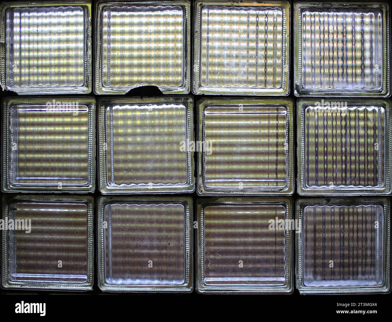 Old-fashioned square glass bricks instead of a window Stock Photo - Alamy