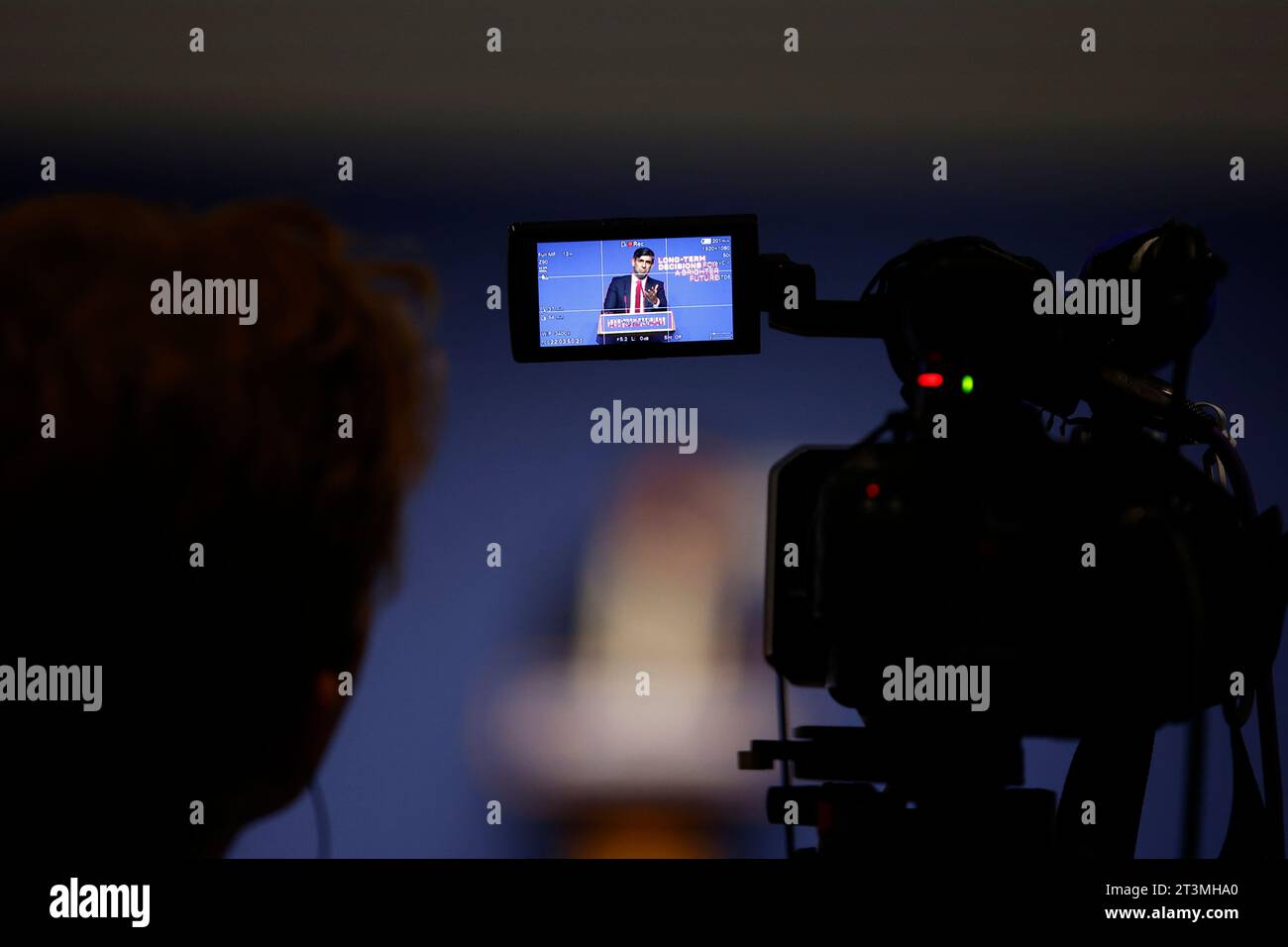 Prime Minister Rishi Sunak is seen on the screen of a camera as he ...