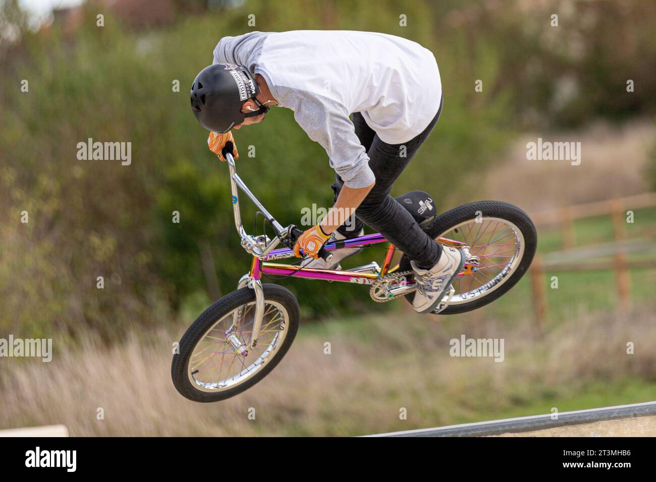 Boys jumping with bikes hi-res stock photography and images - Alamy