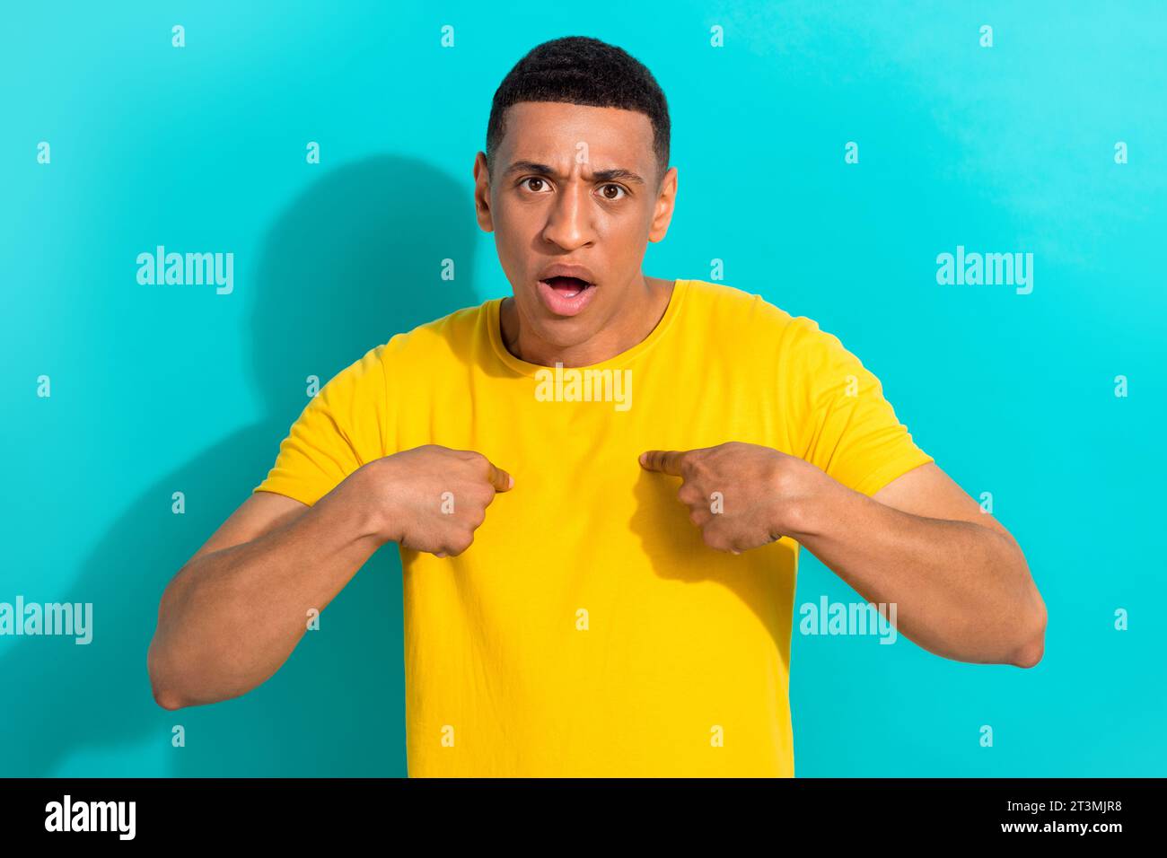 Portrait of impressed speechless person point fingers self himself ...