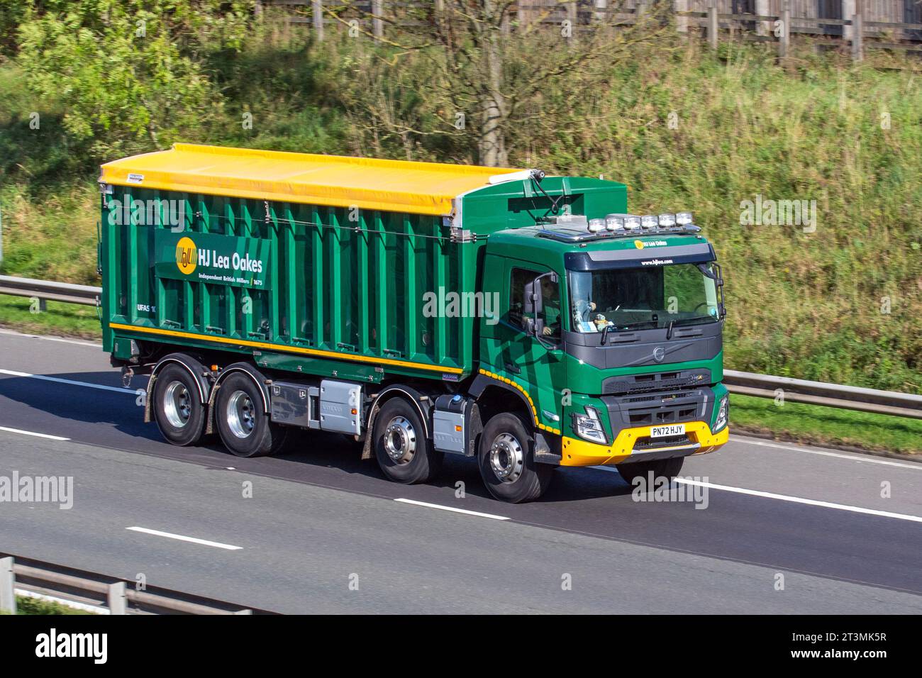 HJ Lea Oakes, delivering animal farmers feeds to small holders; pig ...