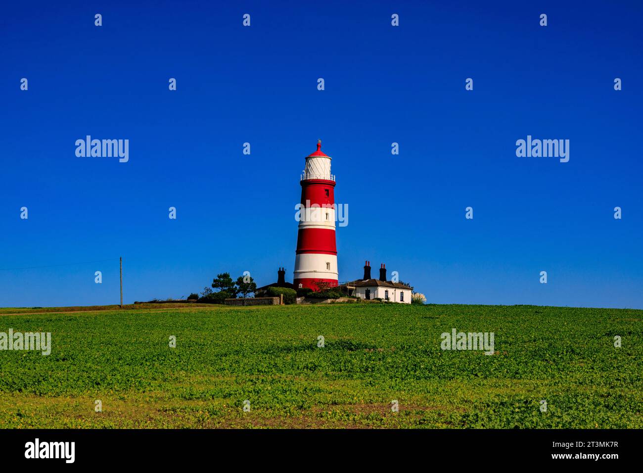 Happisburgh lighthouse, Norfolk is a local landmark, the oldest working ...