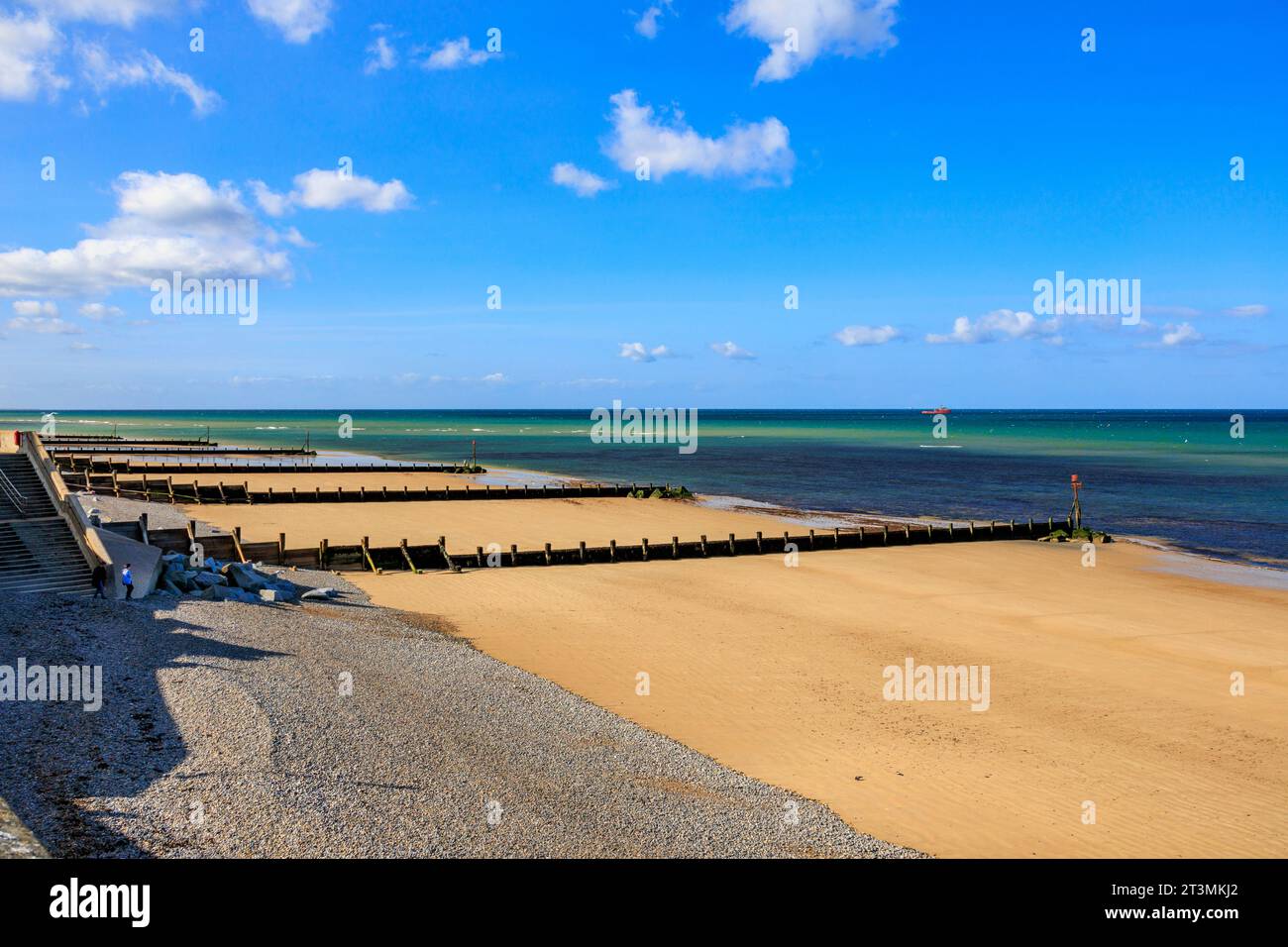 The attractive wooden groynes on the beach at Sheringham, Norfolk ...