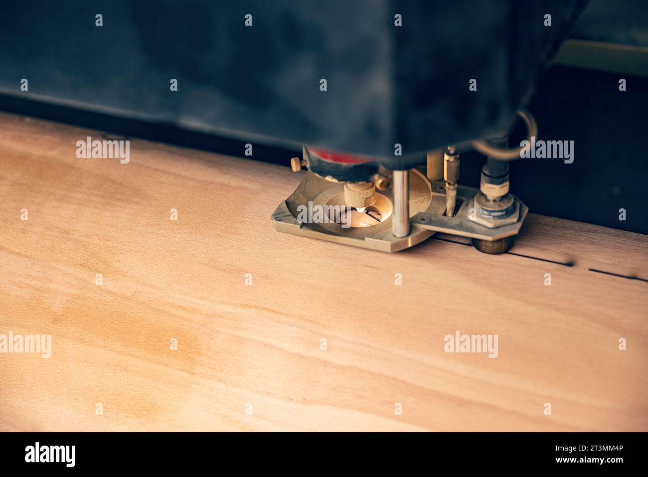 Modern laser technology for engraving details. Fabricate work, factory ...