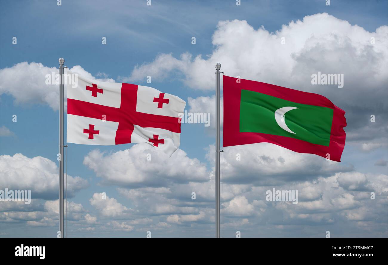 Maldives and Georgia flags waving together on blue cloudy sky, two country relationship concept ...