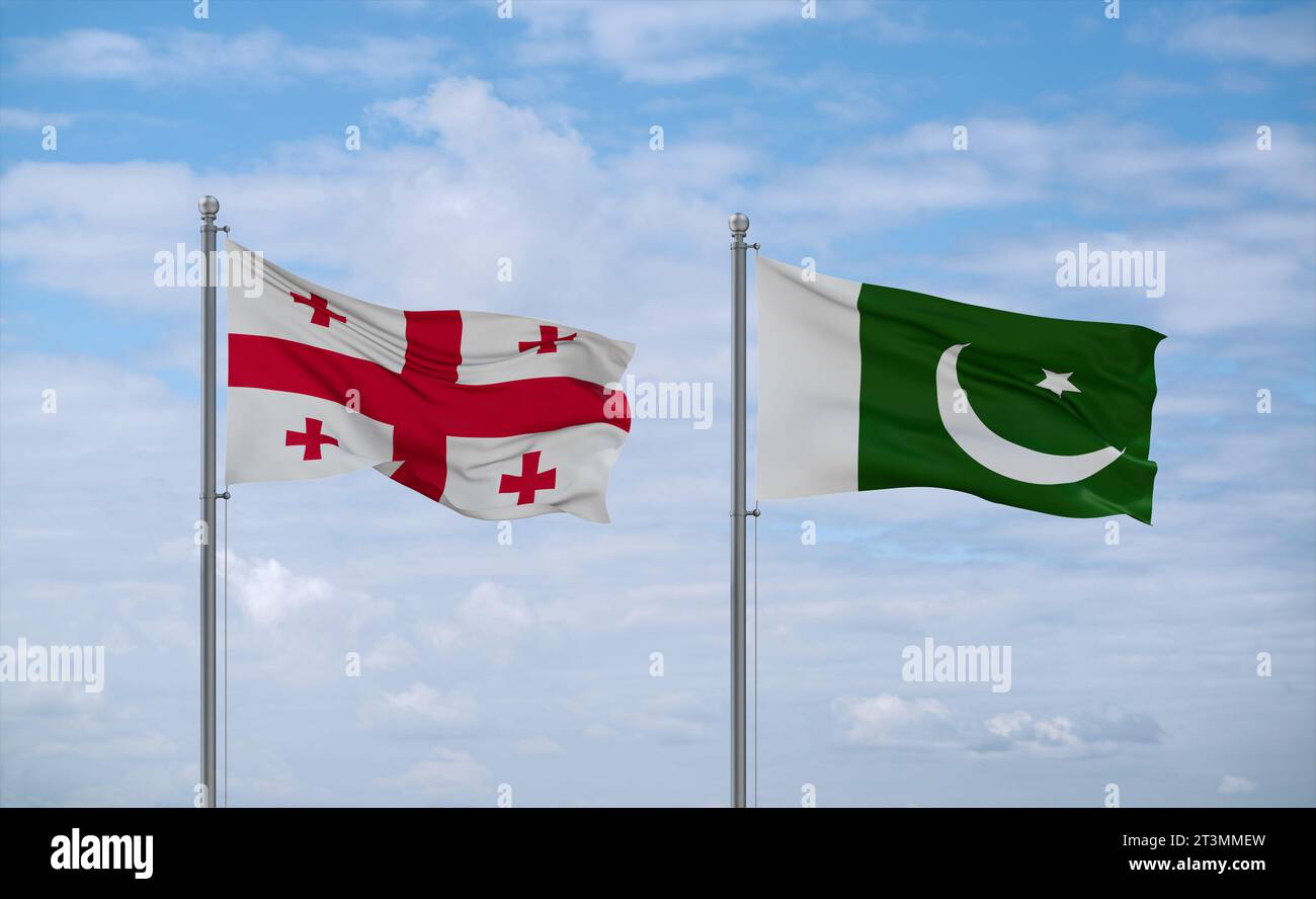 Pakistan and Georgia flags waving together on blue cloudy sky, two ...