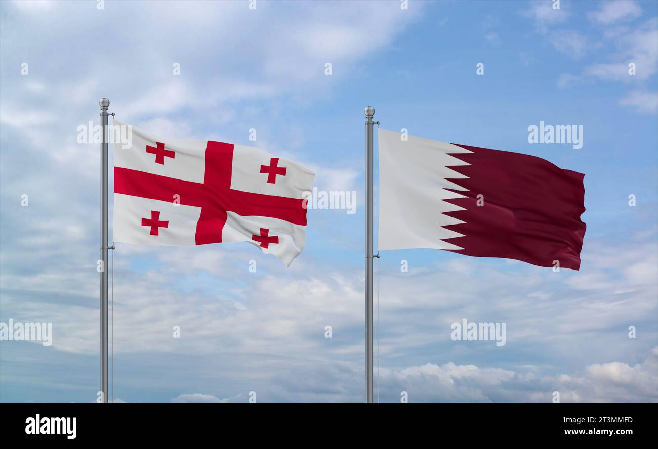 Qatar and Georgia flags waving together in the wind on blue cloudy sky ...