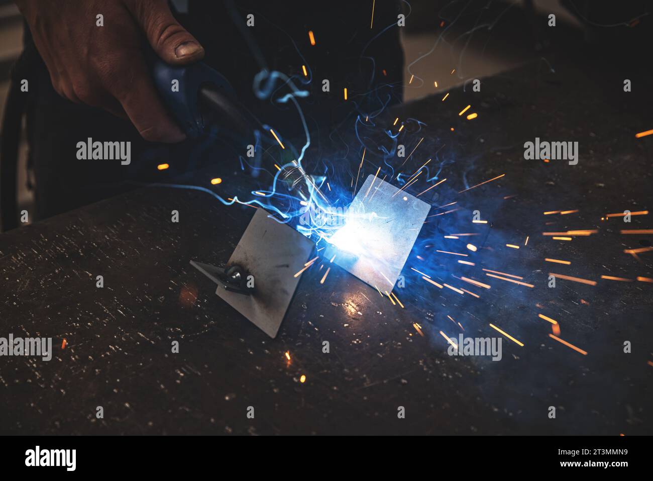Welding of steel, sparking, light colored like fireworks Stock Photo ...