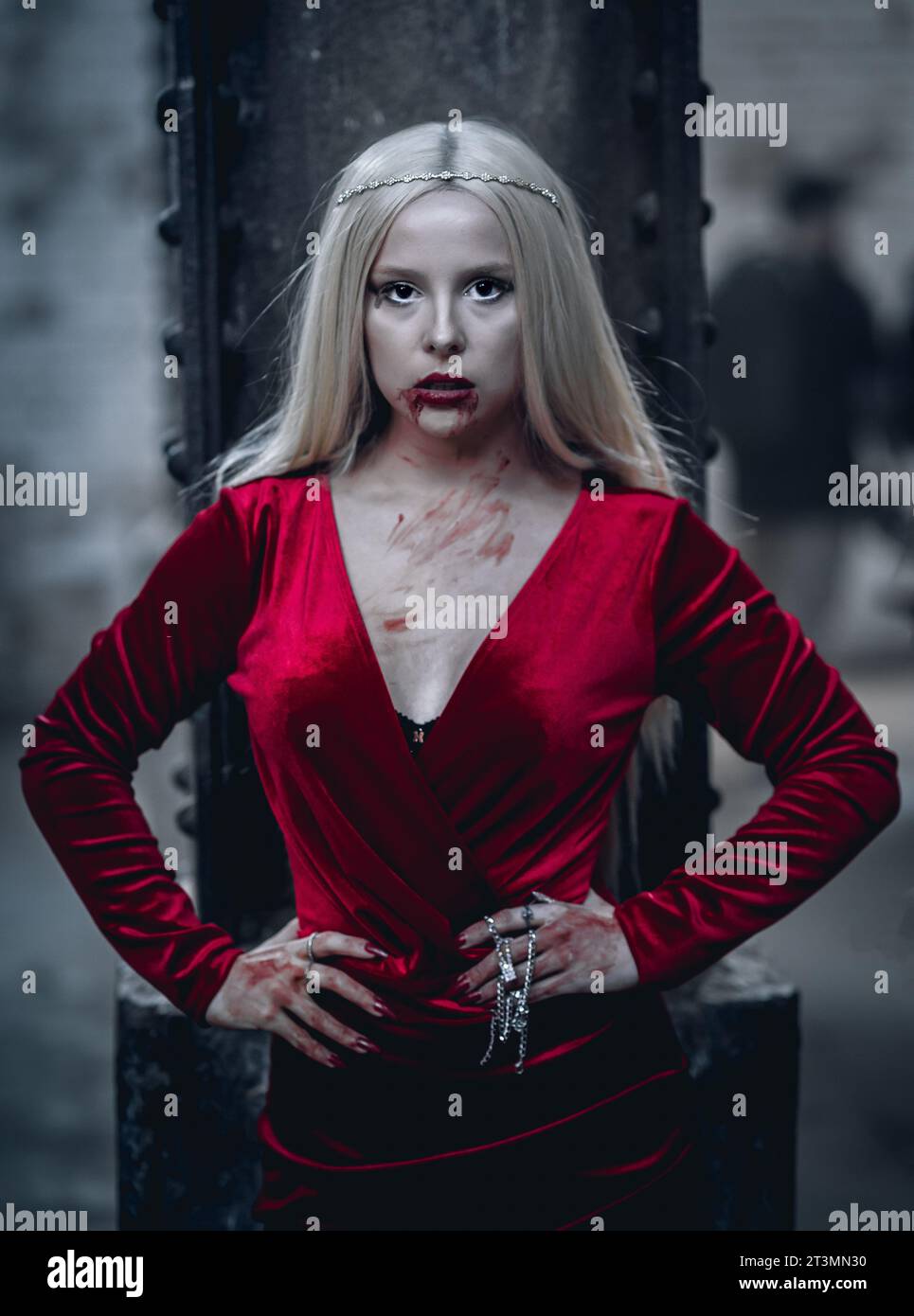 portrait of a woman in red dress with blood on face and chest Stock ...