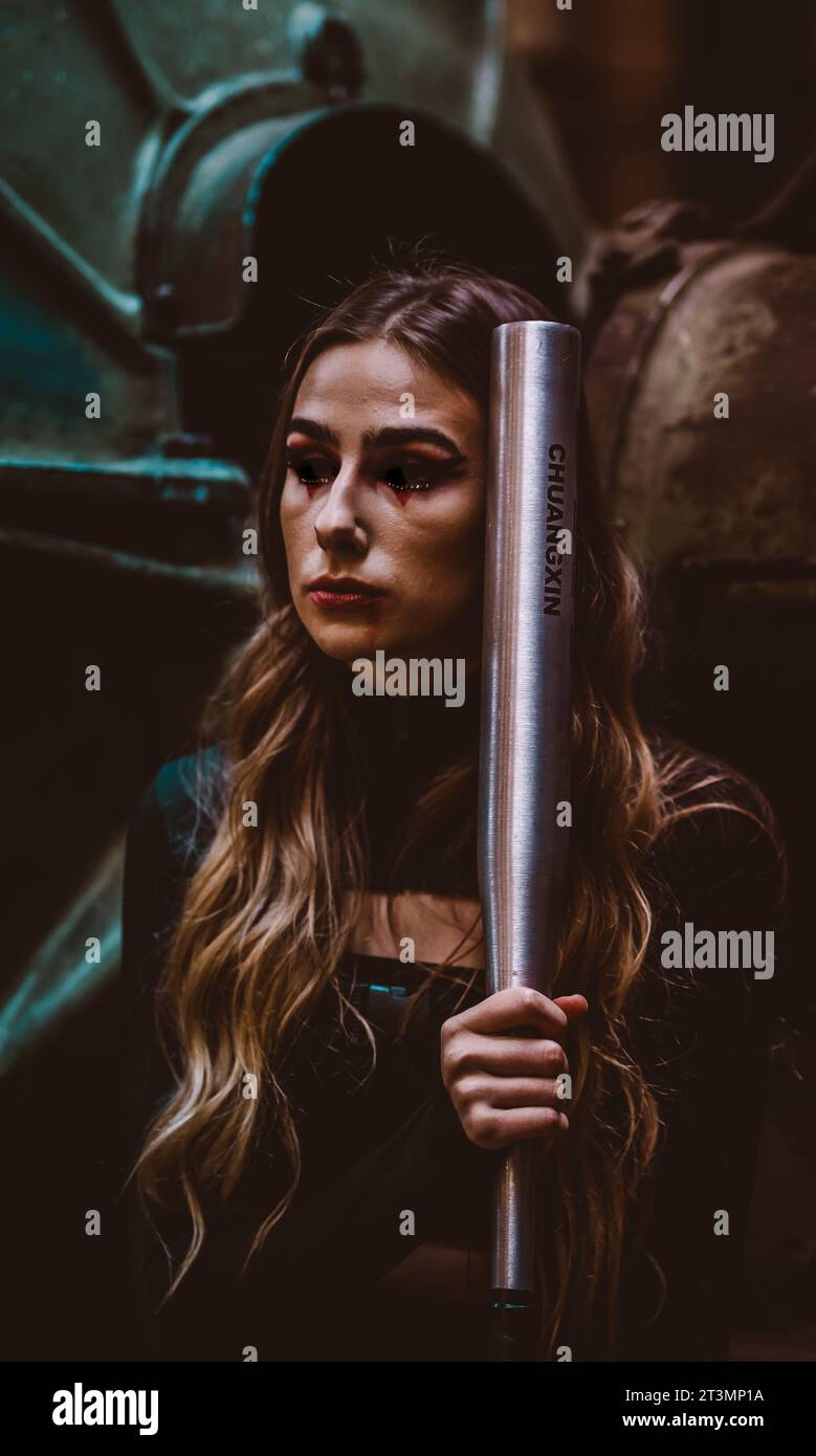 Female Holding Baseball bat Stock Photo - Alamy