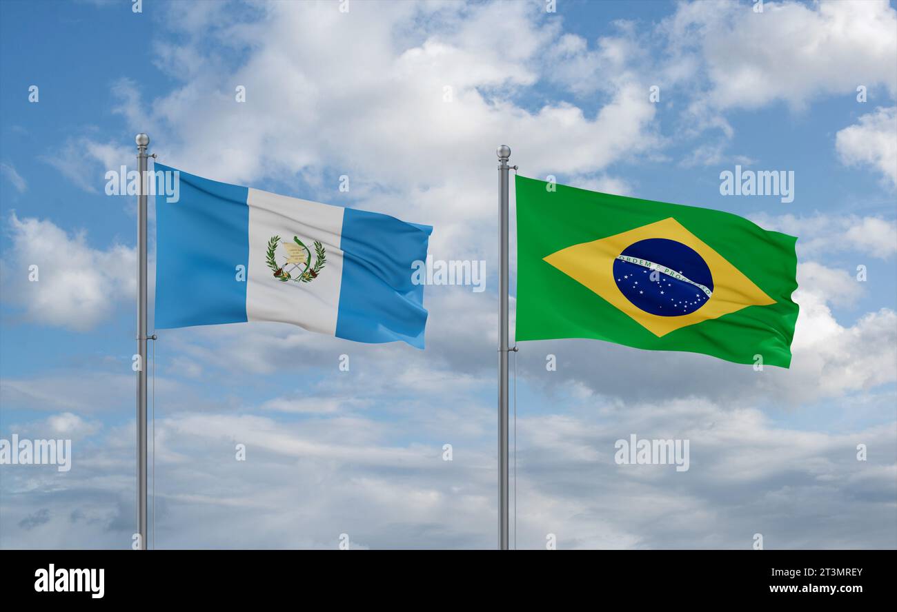 Brazil and Guatemala flags waving together on blue cloudy sky, two country relationship concept ...