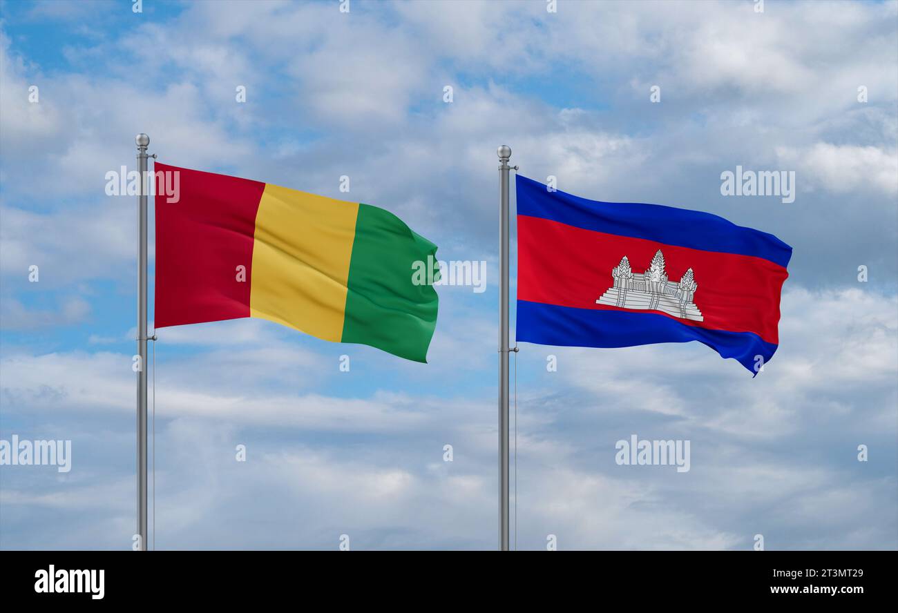 Cambodia and Guinea-Conakry, Guinea flags waving together on blue ...