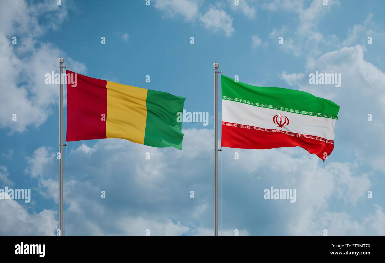 Iran and Guinea-Conakry, Guinea flags waving together on blue cloudy ...