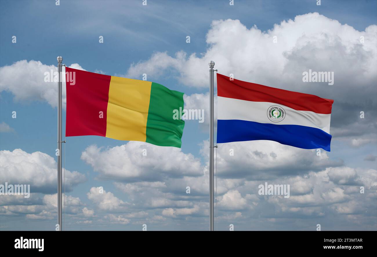 Paraguay and Guinea-Conakry, Guinea flags waving together on blue ...