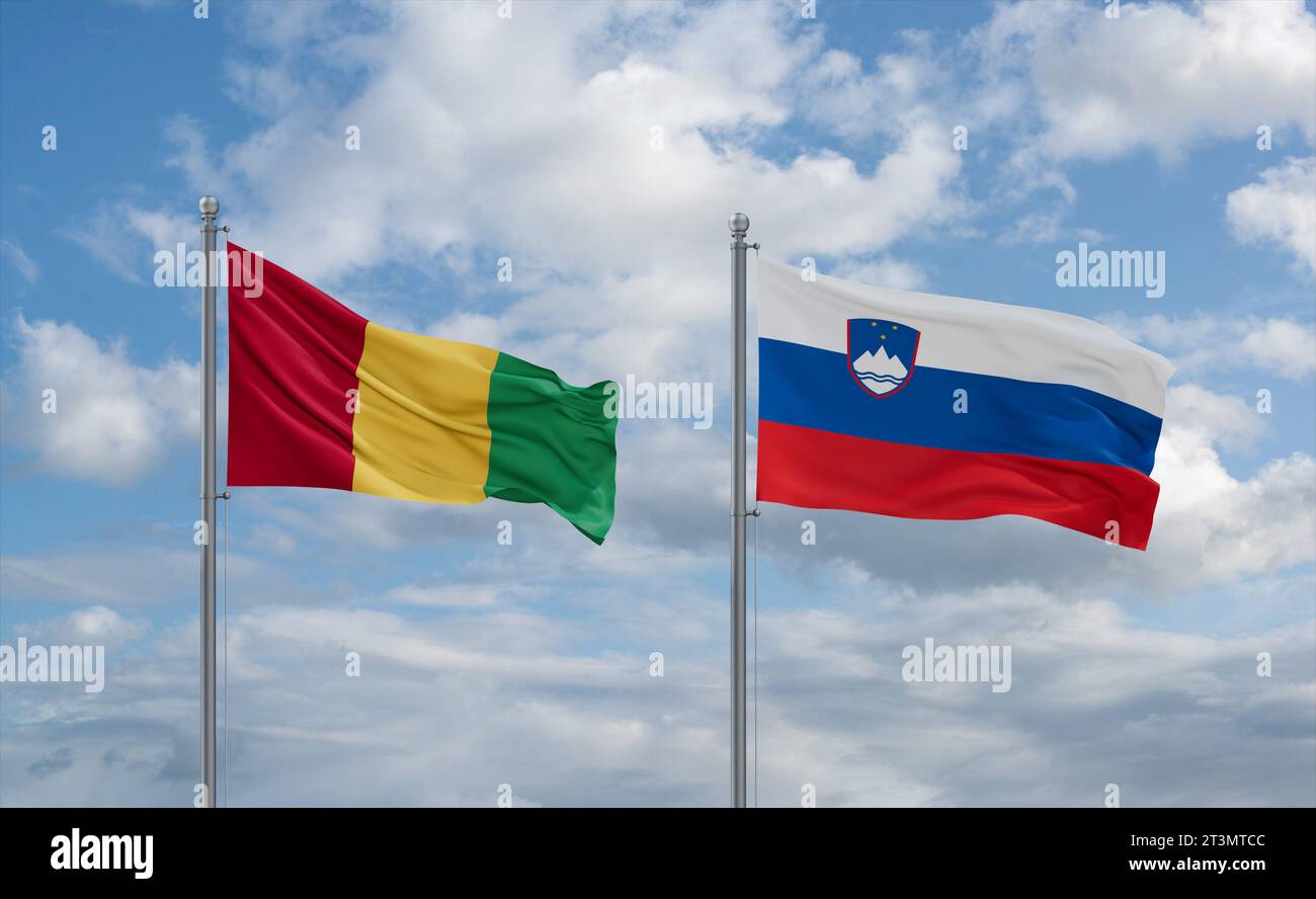 Slovenia and Guinea-Conakry, Guinea flags waving together in the wind ...