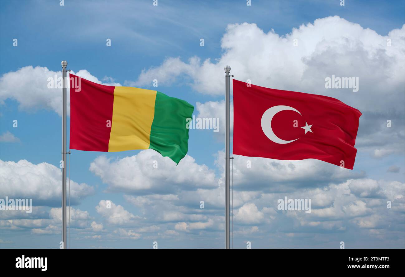 Republic of Turkey and Guinea-Conakry, Guinea flags waving together in ...