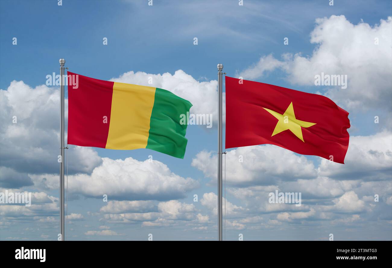 Vietnam and Guinea-Conakry, Guinea flags waving together in the wind on ...