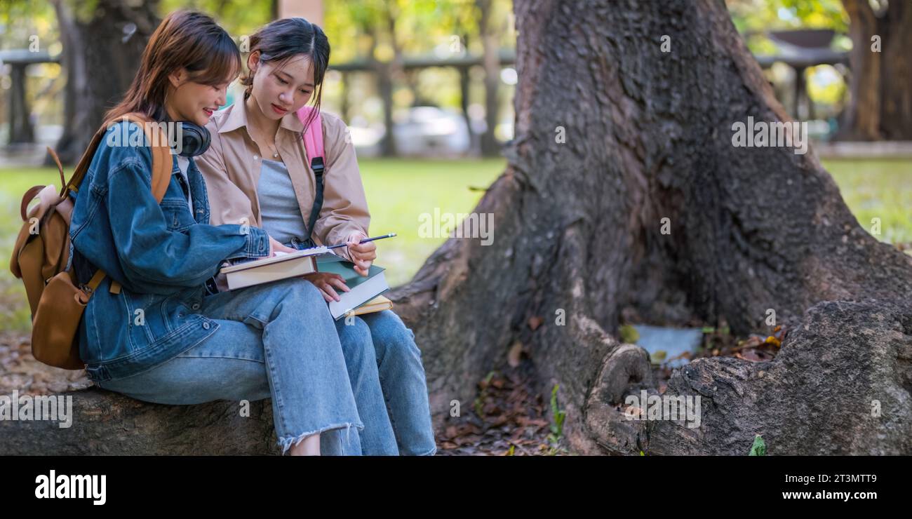 Happy young student chat with each other after class. girls wear casual ...