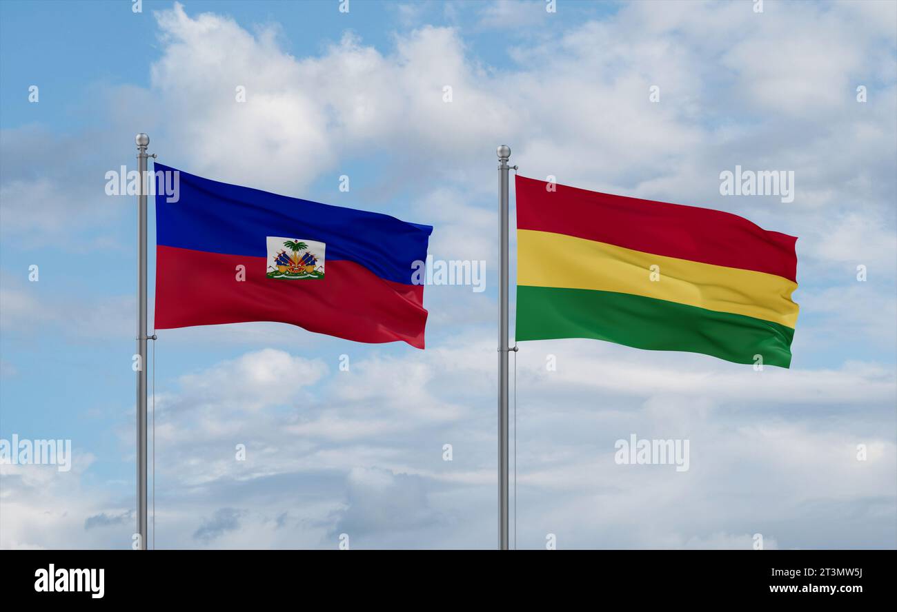 Bolivia and Haiti flags waving together on blue cloudy sky, two country ...