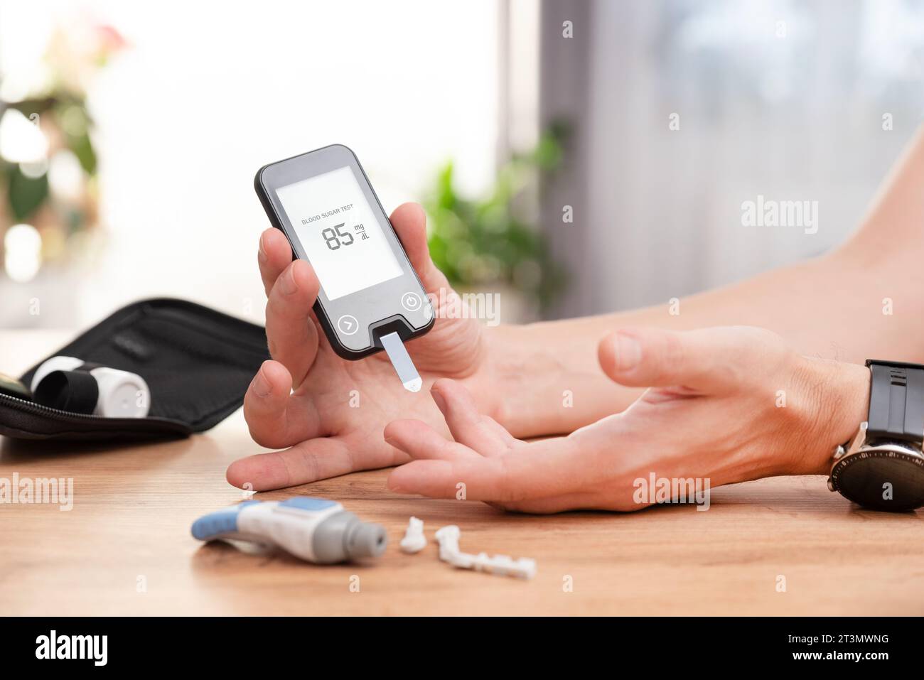 Woman using glucometer check hi-res stock photography and images - Alamy