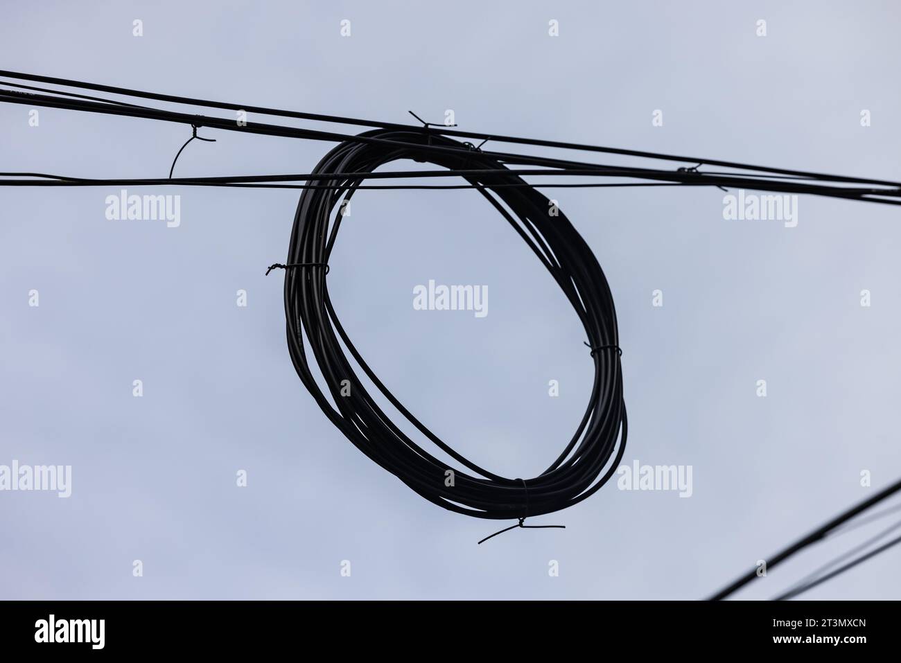 messy chaos wires cables , telephone and internet fiber signal line ...