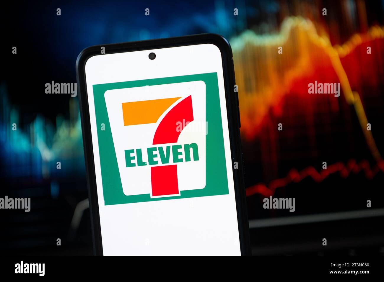 In this photo illustration a 7 Eleven logo seen displayed on a ...