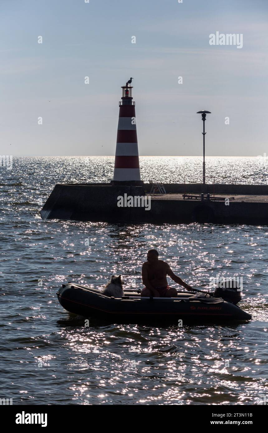 Lighthouse, boat, man and dog. Illustration Stock Photo - Alamy