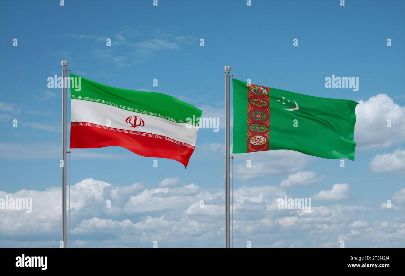 Turkmenistan and Iran flags waving together in the wind on blue cloudy ...