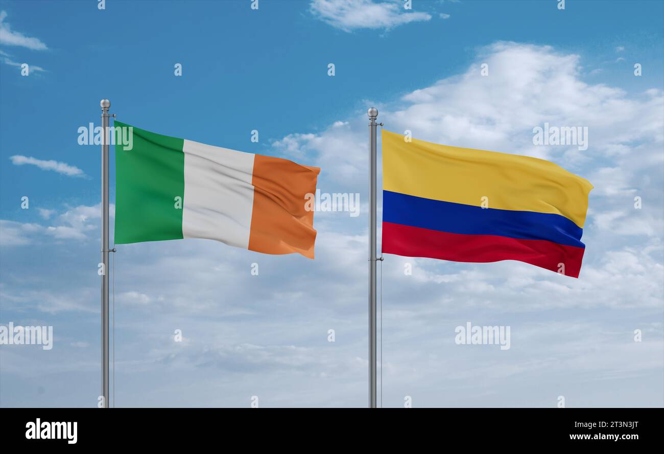 Colombia and Ireland flags waving together in the wind on blue cloudy ...