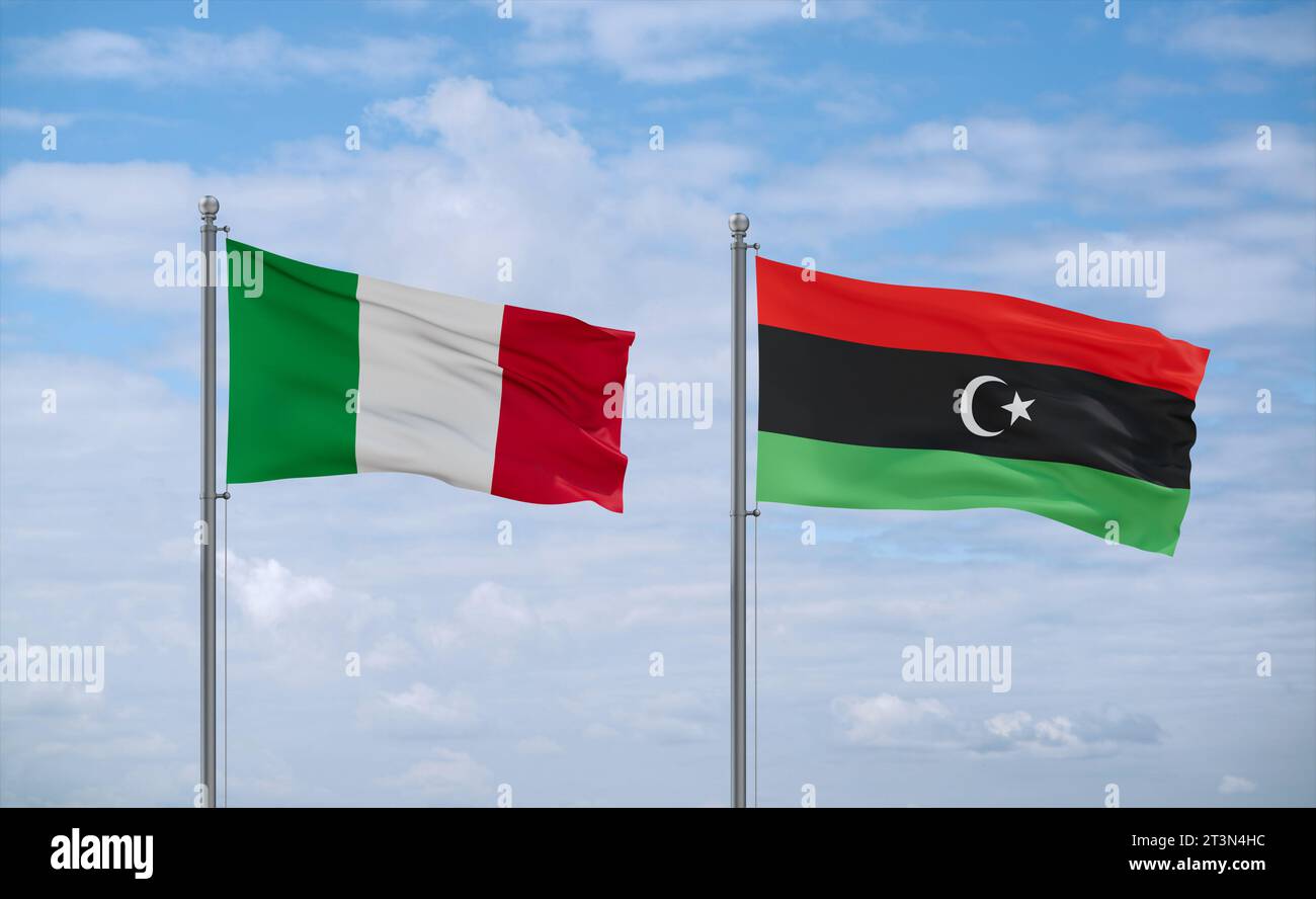 Libya and Italy flags waving together in the wind on blue cloudy sky ...