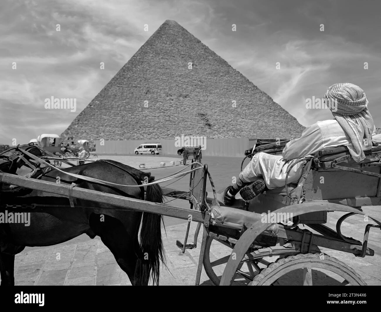 Pyramid in Giza, Egypt: A horse cart waiting for customers while the ...