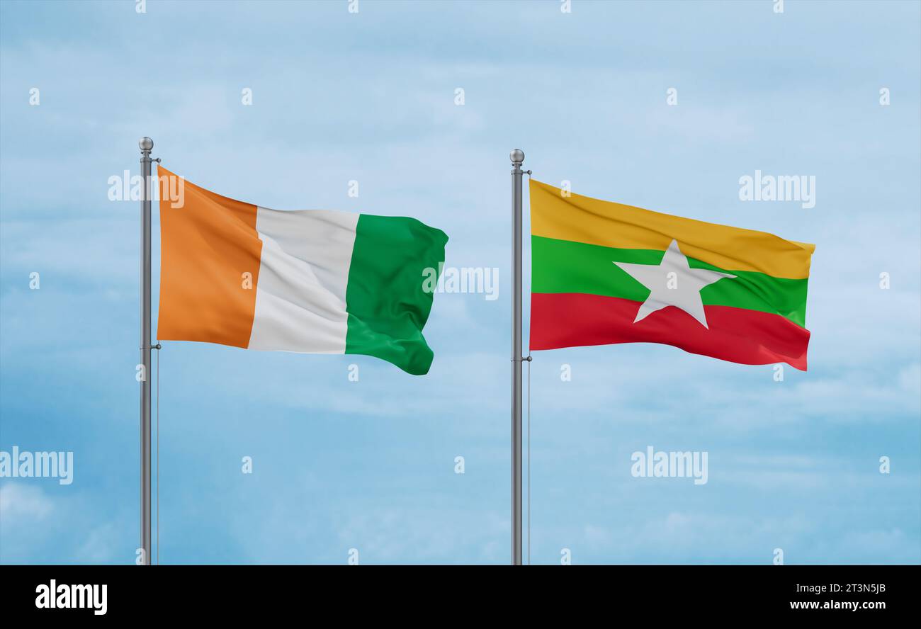 Myanmar aka Burma and Ivory Coast flags waving together on blue cloudy ...