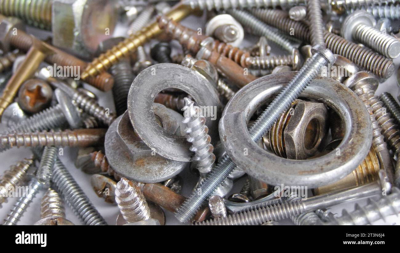 hardware metal background with screws nuts bolts Stock Photo - Alamy