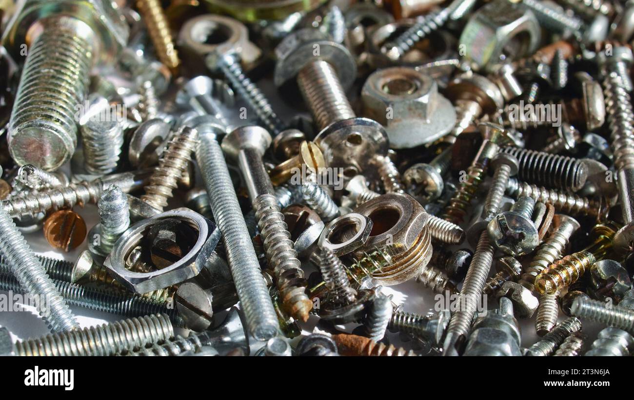 hardware metal background with screws nuts bolts Stock Photo - Alamy