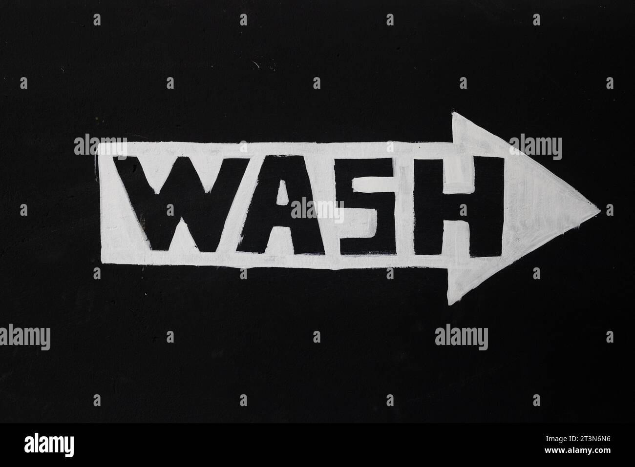 A sign with the word wash in white font on a black background.Car wash ...
