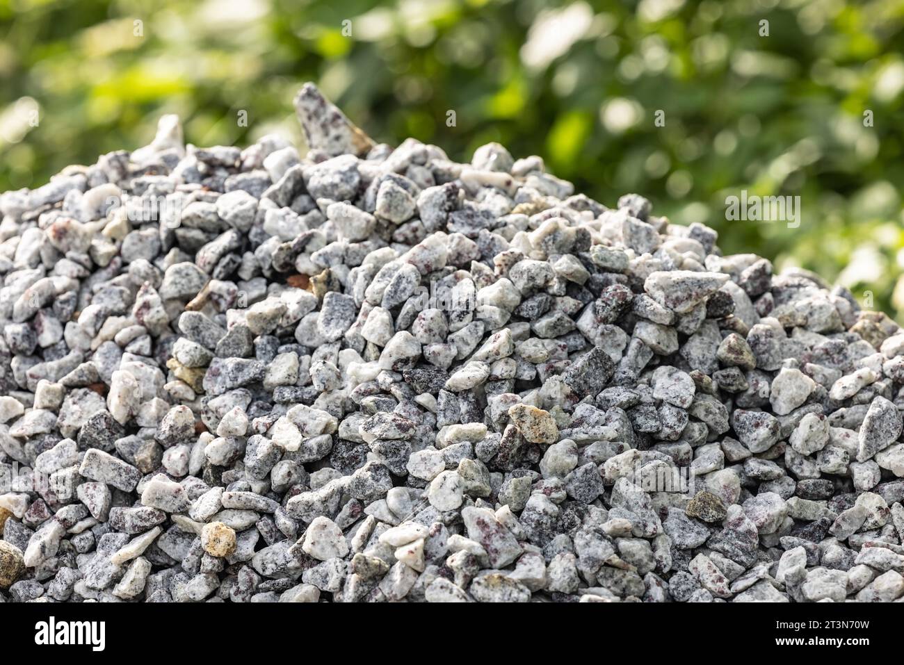 Crushed rock. Small rocks ground. Crushed stone road building material ...