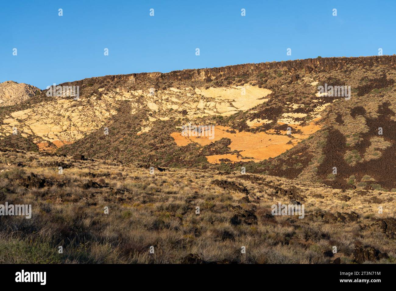 Volcanic basalt boulder fields on the slopes of Navajo sandstone ...