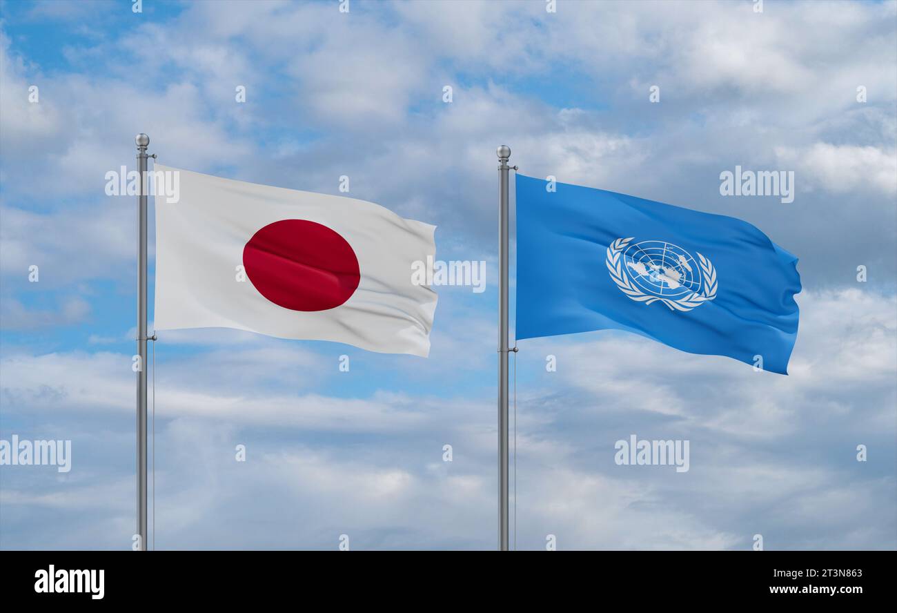 United Nations and Japan flags waving together in the wind on blue ...