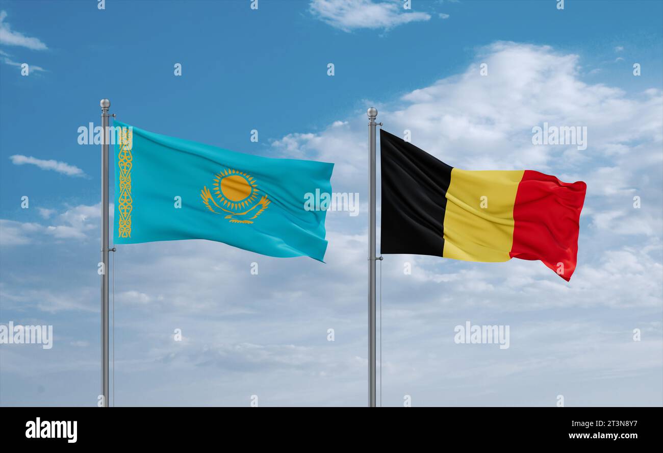 Belgium and Kazakhstan flags waving together on blue cloudy sky, two country relationship ...