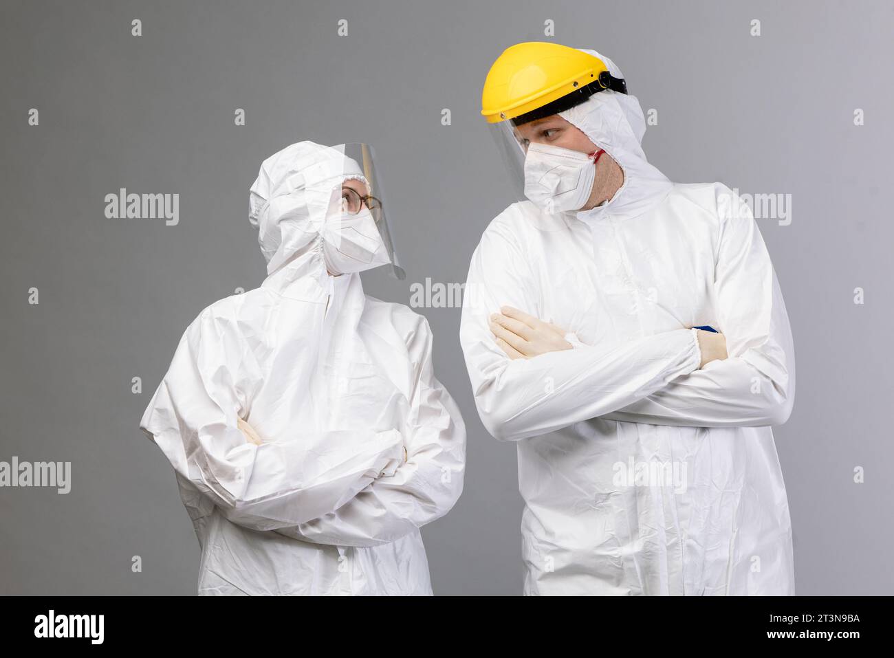 Two professional doctors together fighting against COVID-19 or ...