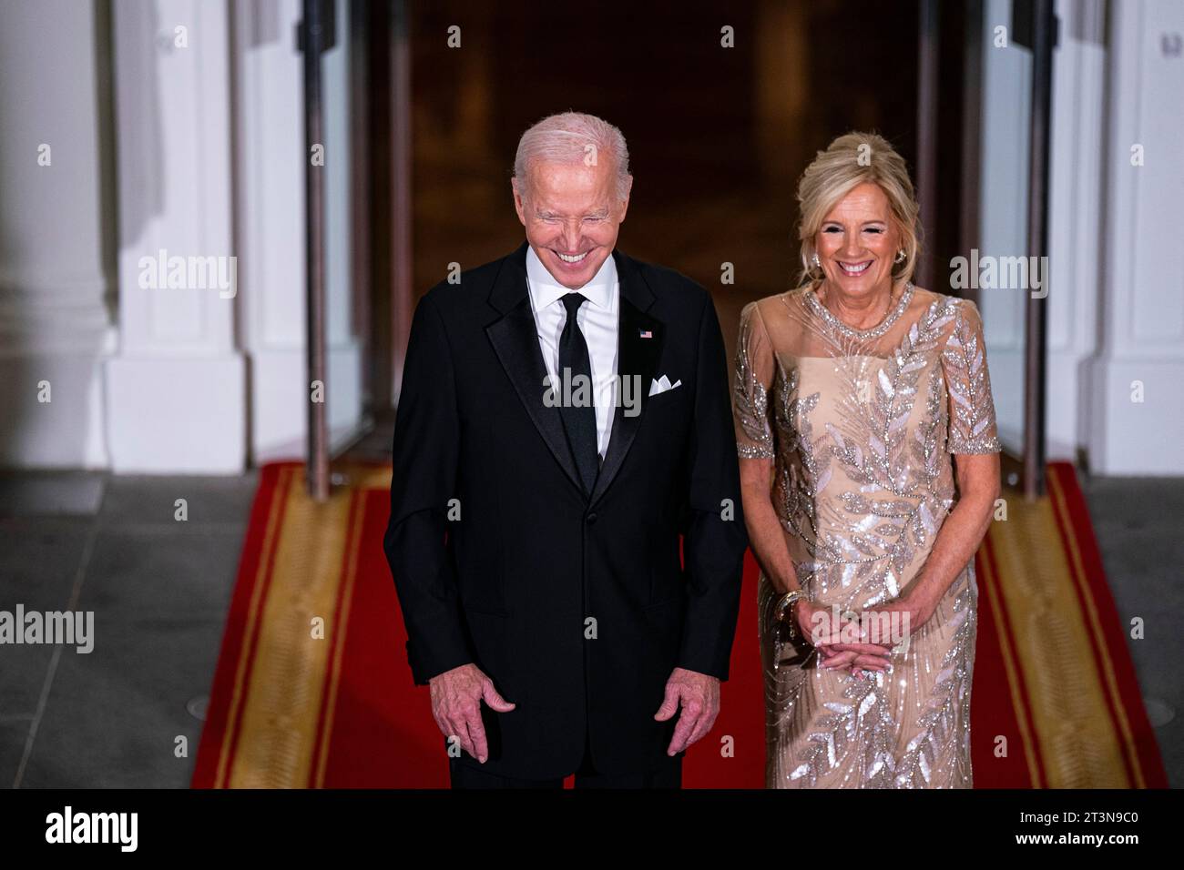 US President Joe Biden and US First Lady Jill Biden wait to greet ...