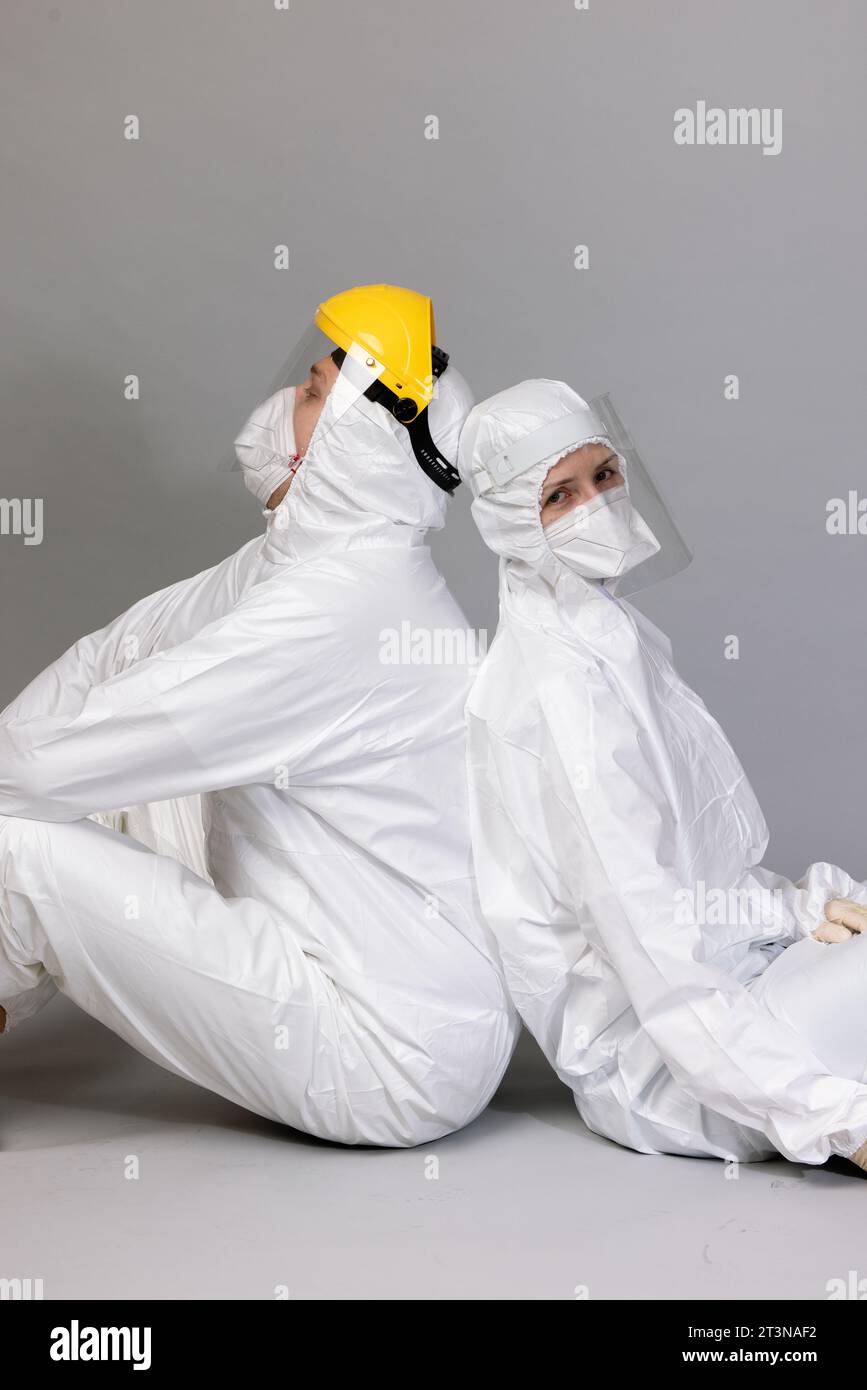 Two professional doctors together fighting against COVID-19 or ...