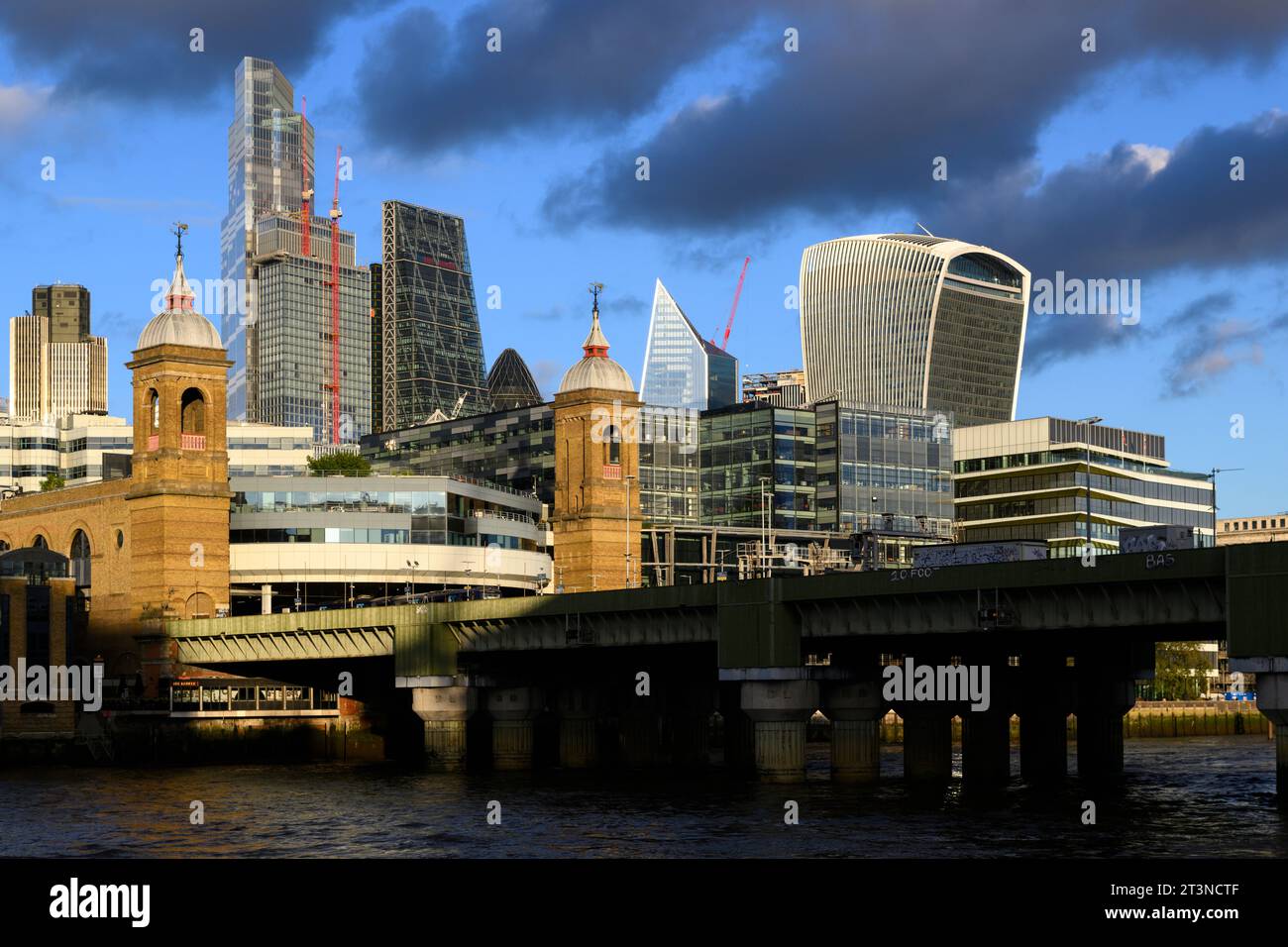 The river side view of Cannon Street railway bridge and station with ...