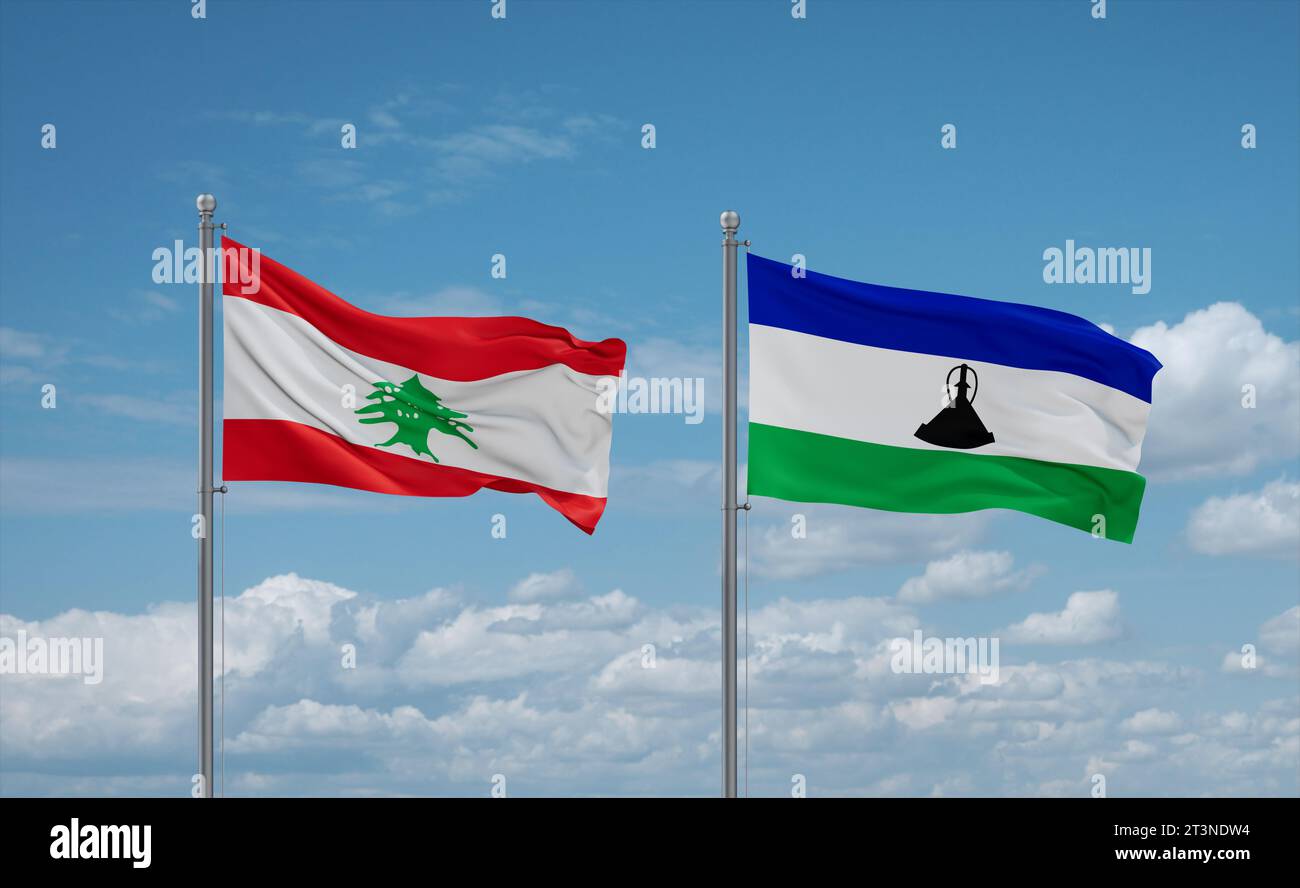 Lesotho and Lebanon flags waving together in the wind on blue cloudy ...