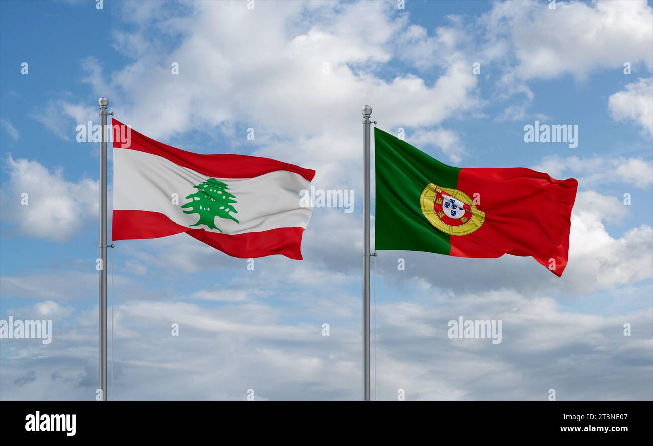 Portugal and Lebanon flags waving together in the wind on blue cloudy ...
