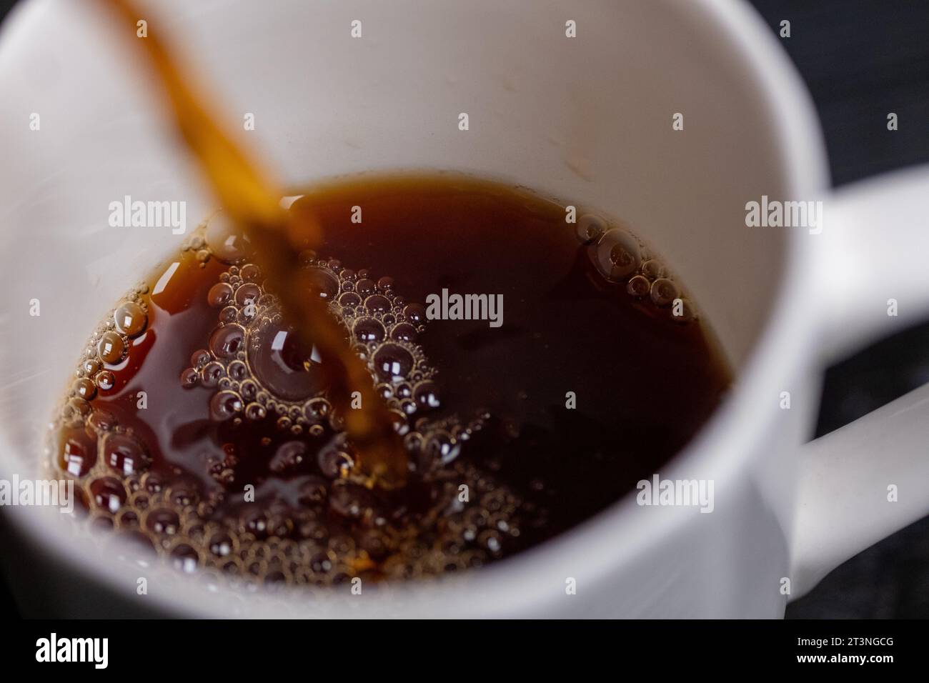 Pouring mocha coffee in white hi-res stock photography and images - Alamy