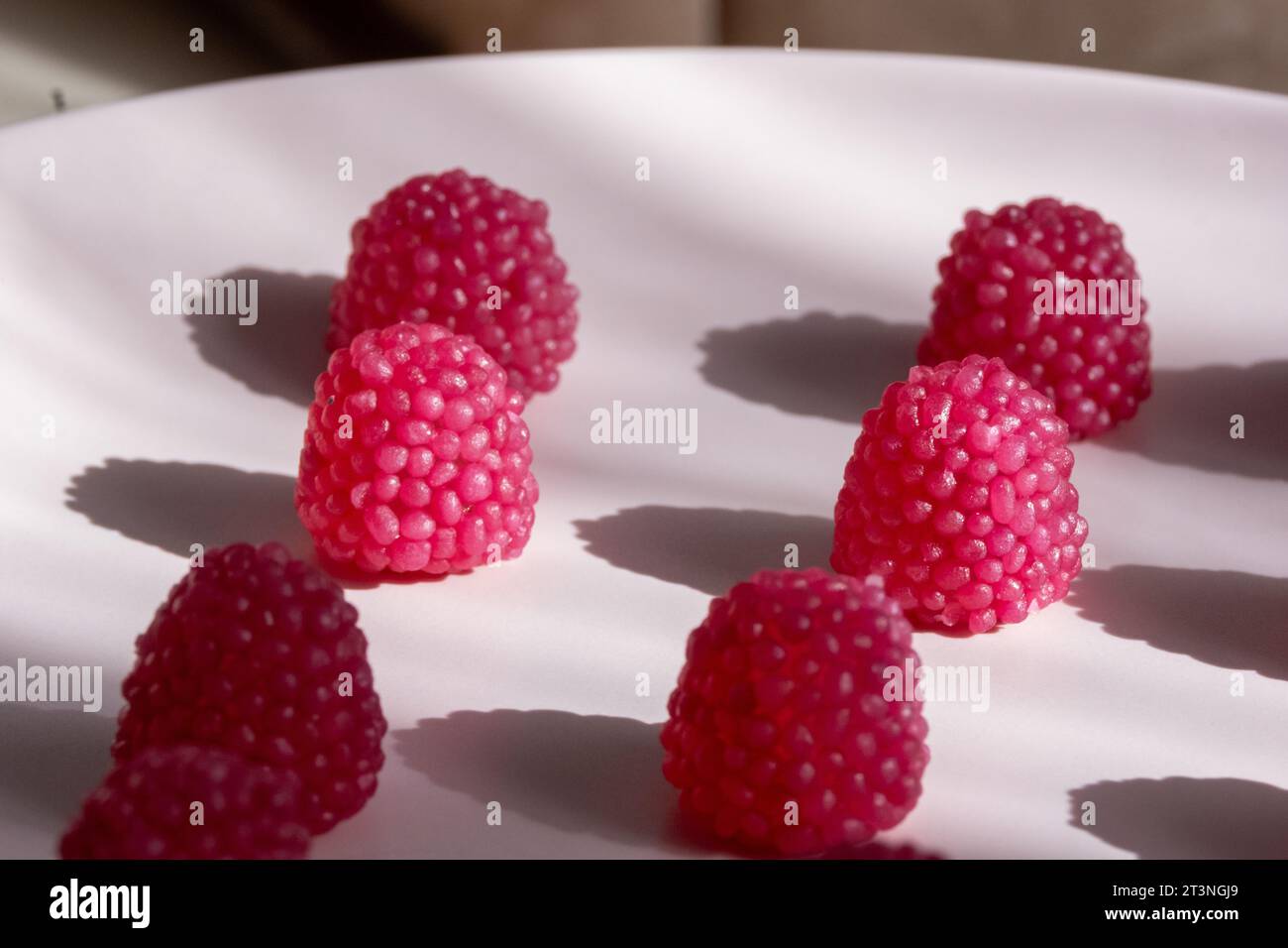 red and black forest berry shaped candies in macro shot Stock Photo - Alamy