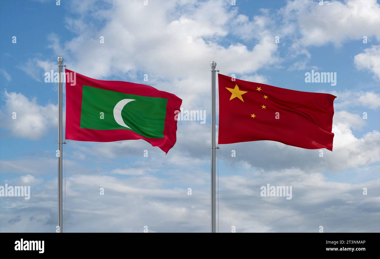 China and Maldives flags waving together on blue cloudy sky, two country relationship concept ...