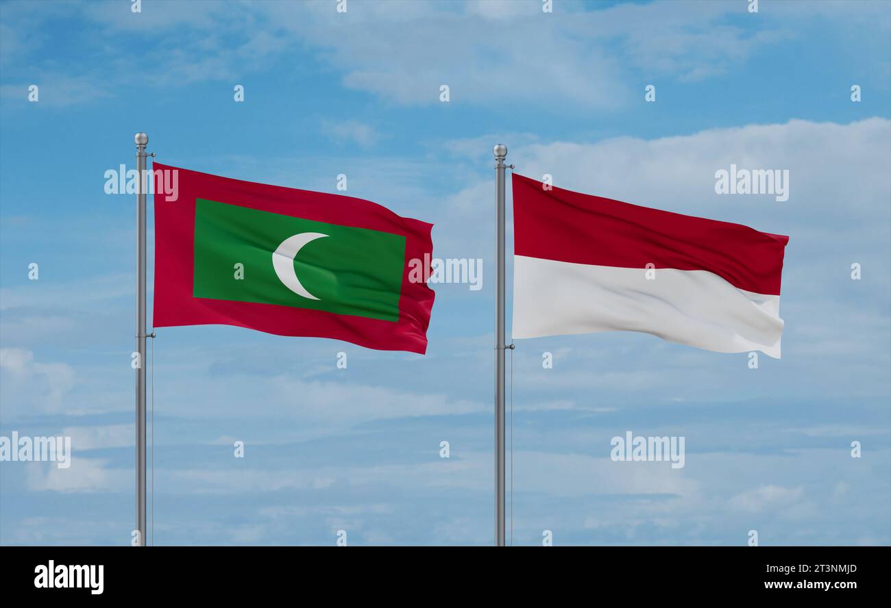 Indonesia and Maldives flags waving together on blue cloudy sky, two country relationship ...