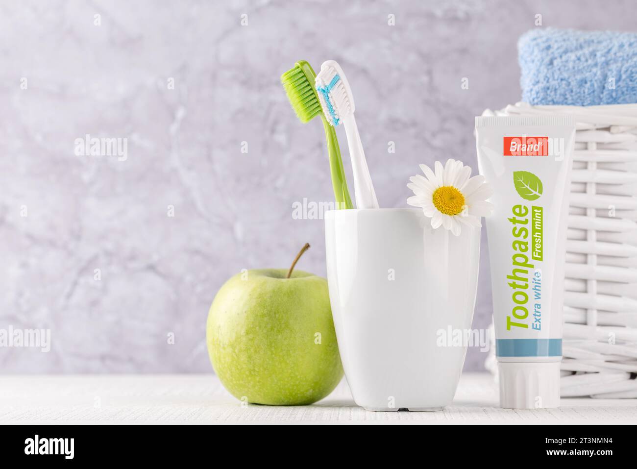 A clean and refreshing image featuring toothpaste and toothbrushes ...
